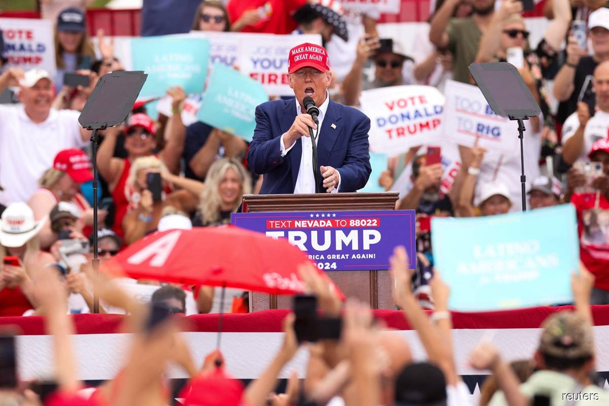 Trump tells sweltering rally in Nevada he won't tax tips